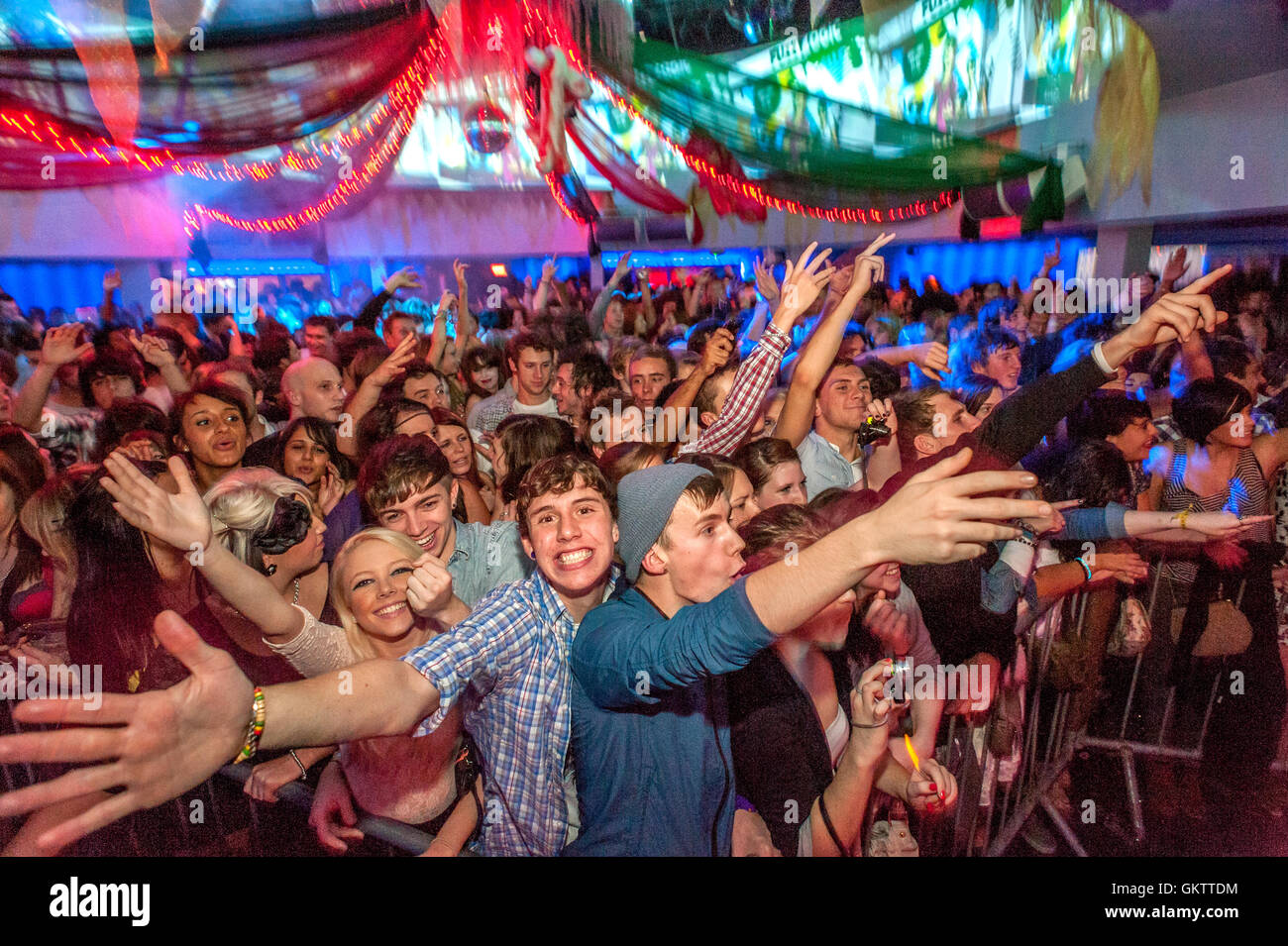 Young people waiting for a personal stage performance by the artist ...