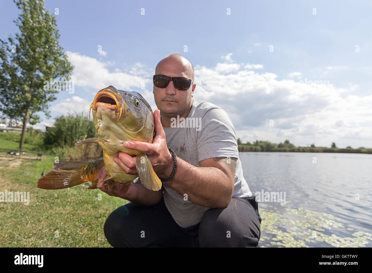 Angler with carp fishing trophy Carp and Fisherman, Carp fishing trophy ...