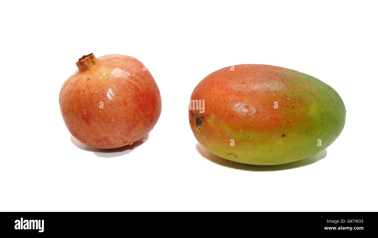Pomegranate and mango Stock Photo - Alamy