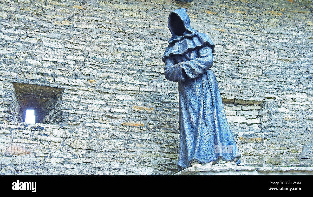Metal statue of monk in Tallinn Stock Photo - Alamy