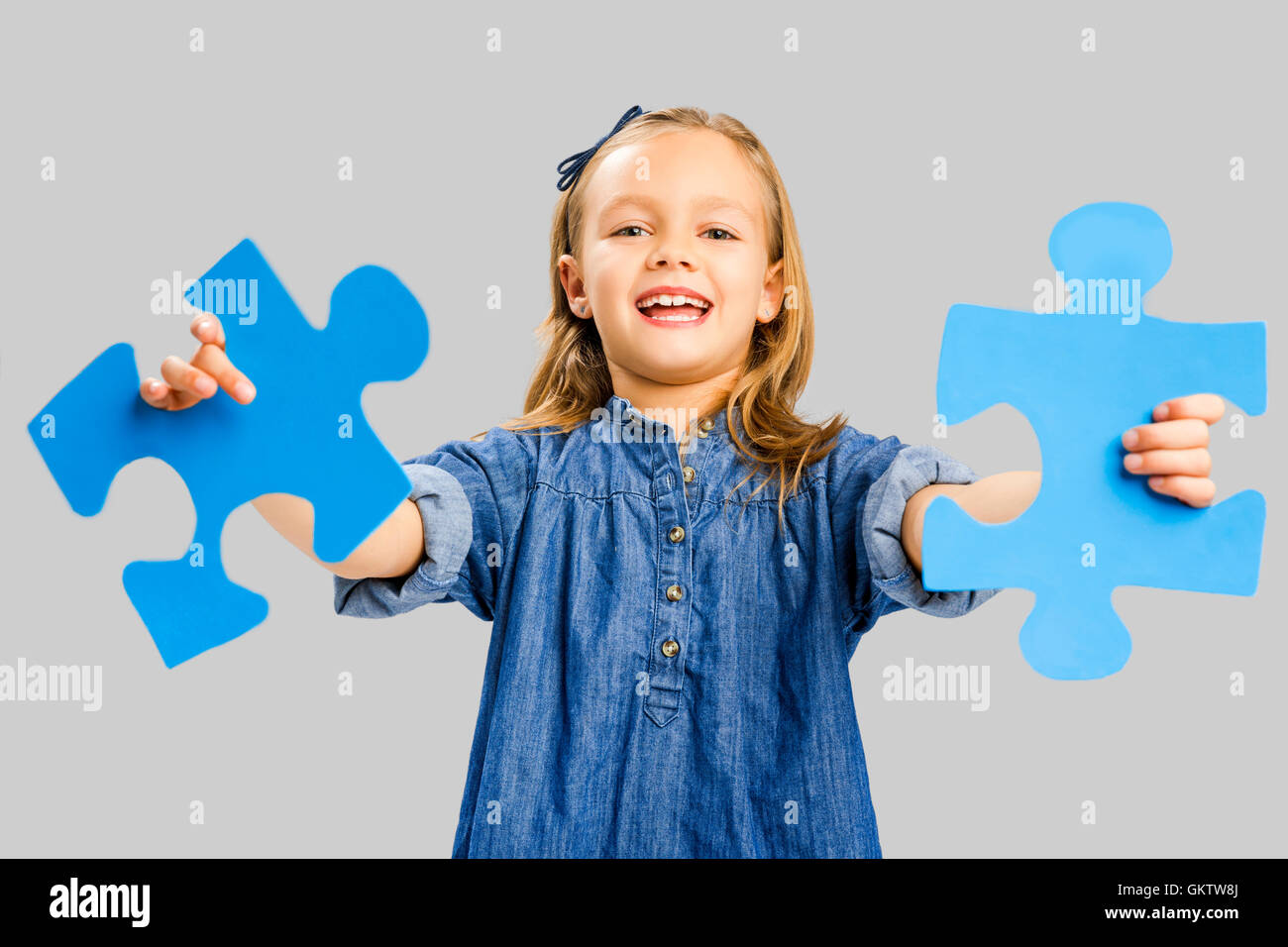 Child puzzle hi-res stock photography and images - Alamy