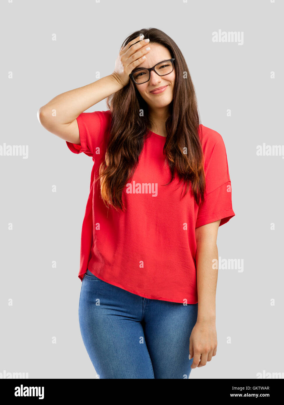 Lovely woman making a forgotten expression Stock Photo - Alamy