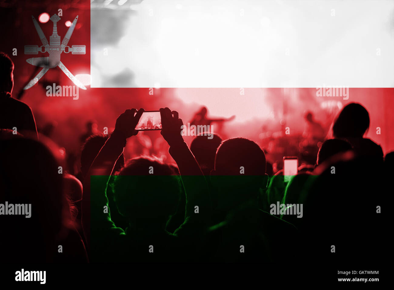 live music concert with blending Oman flag on fans Stock Photo - Alamy