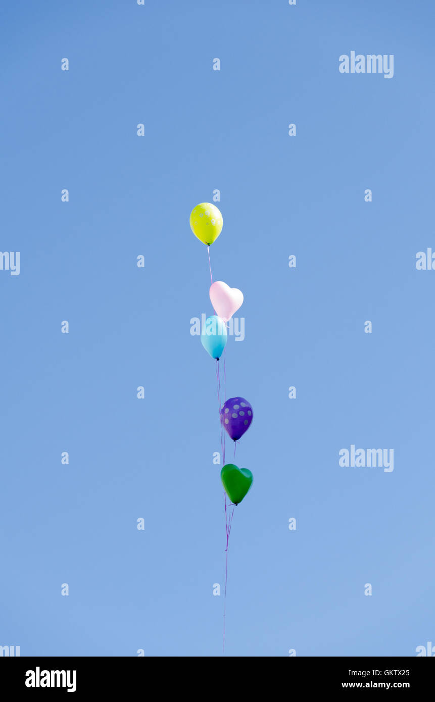 Rising heart balloons hi-res stock photography and images - Alamy