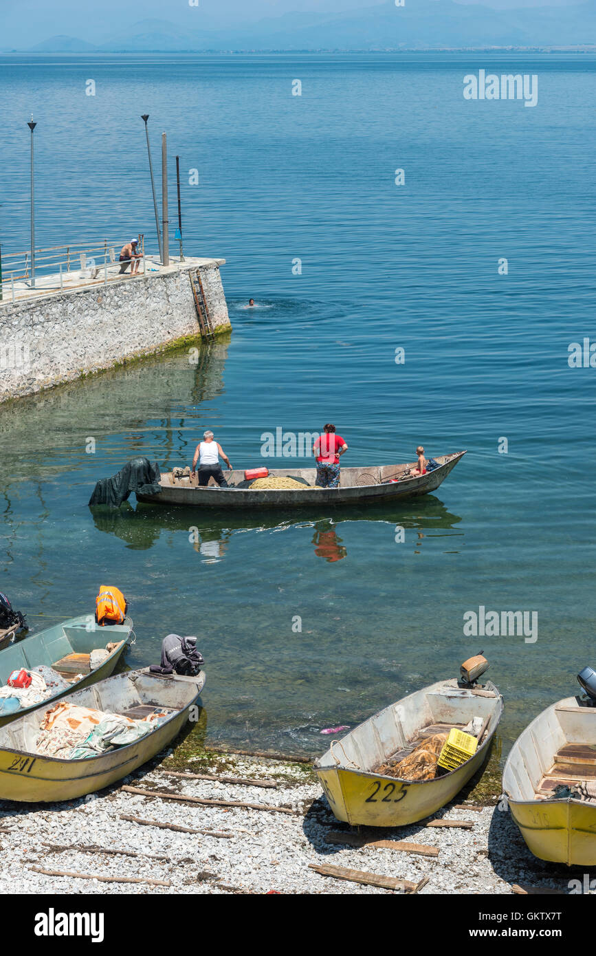 Fishing boats at the village of Zogaj on the shore of Lake Shkodra ...