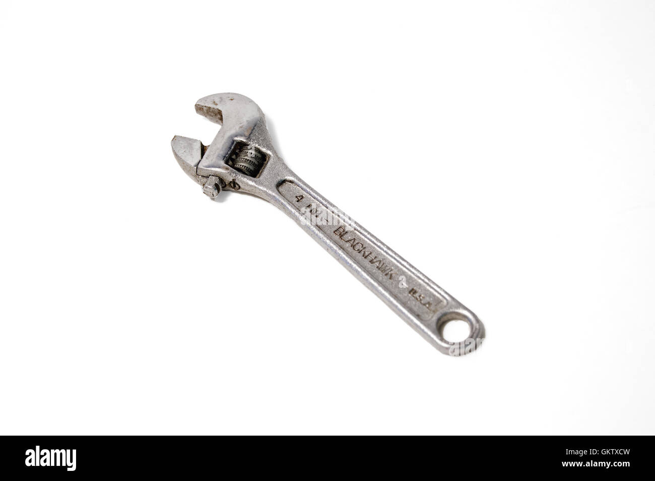 A mini 4 inch steel adjustable wrench on a white background Stock Photo ...