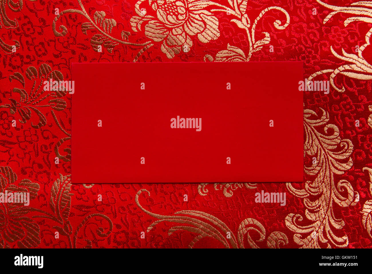 Red pocket on Chinese texture fabric,Chinese new year Stock Photo - Alamy