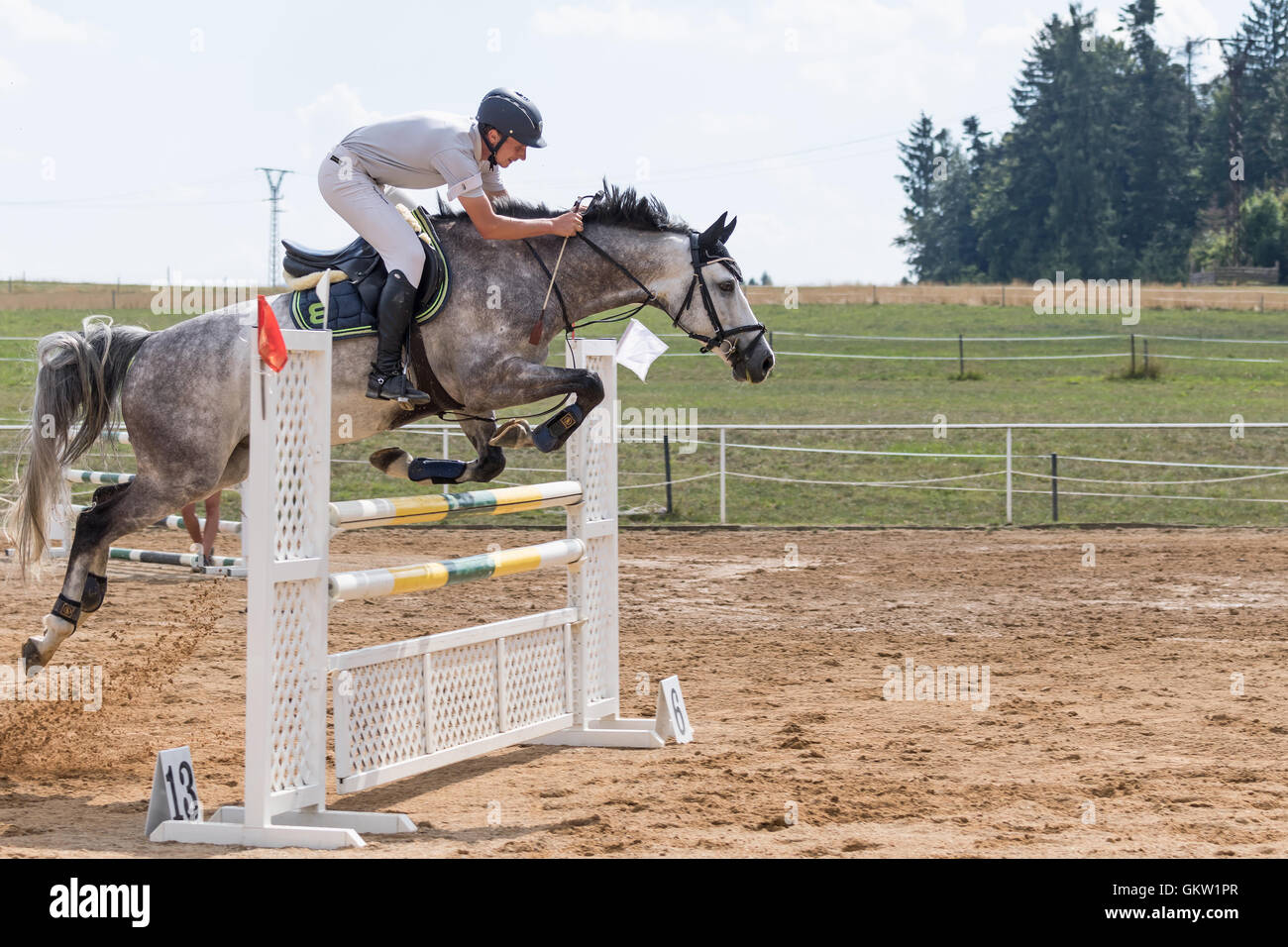 Horseman jumping hi-res stock photography and images - Alamy
