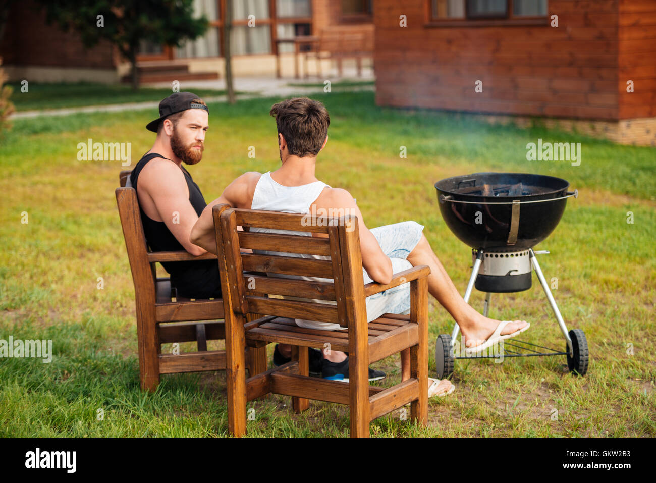 Preparing barbecue grill hi-res stock photography and images - Alamy