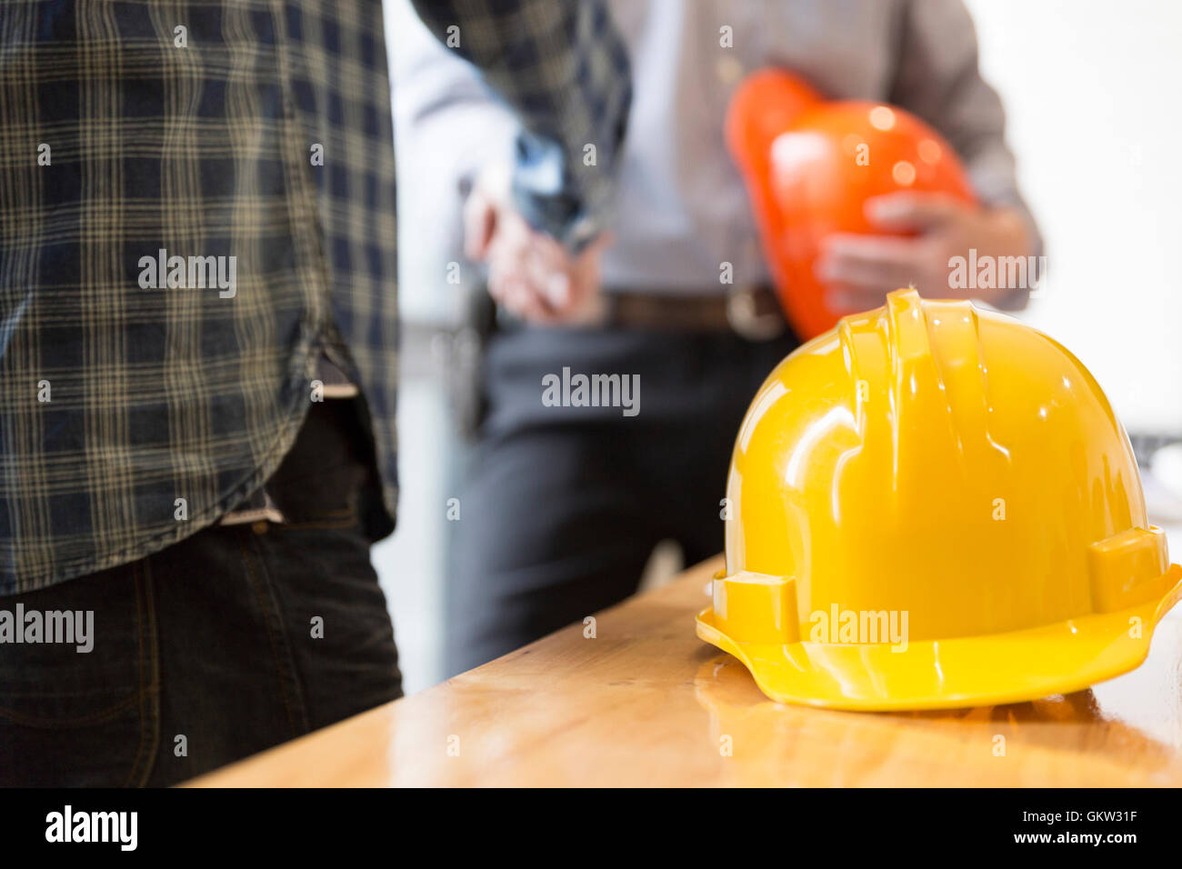 architect engineer shaking hands beside window - business teamwork ...