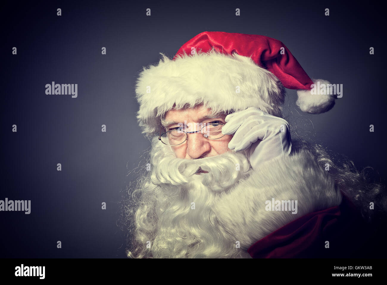 santa claus classic portrait on gray background Stock Photo - Alamy
