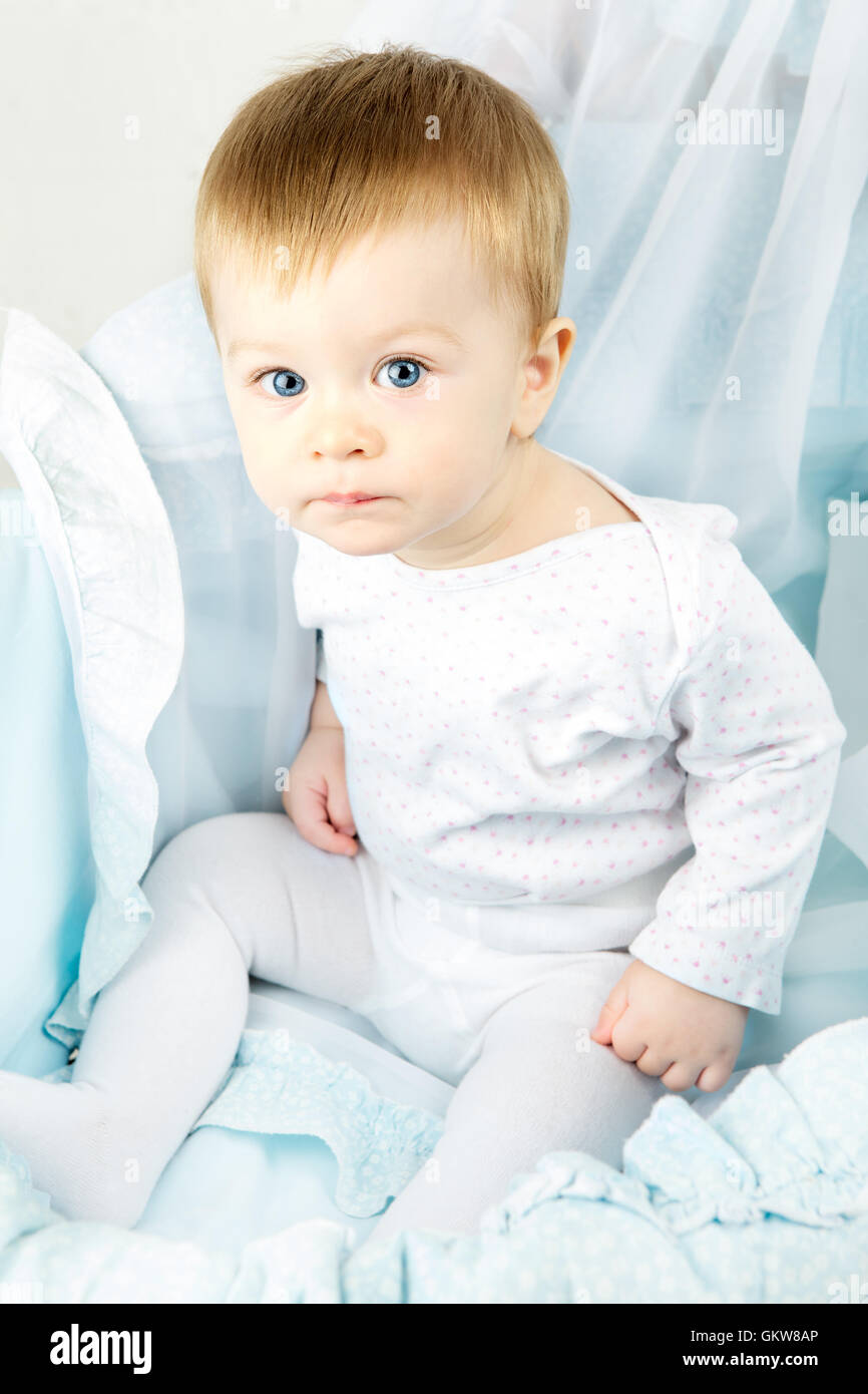 Child in Cradle Stock Photo - Alamy