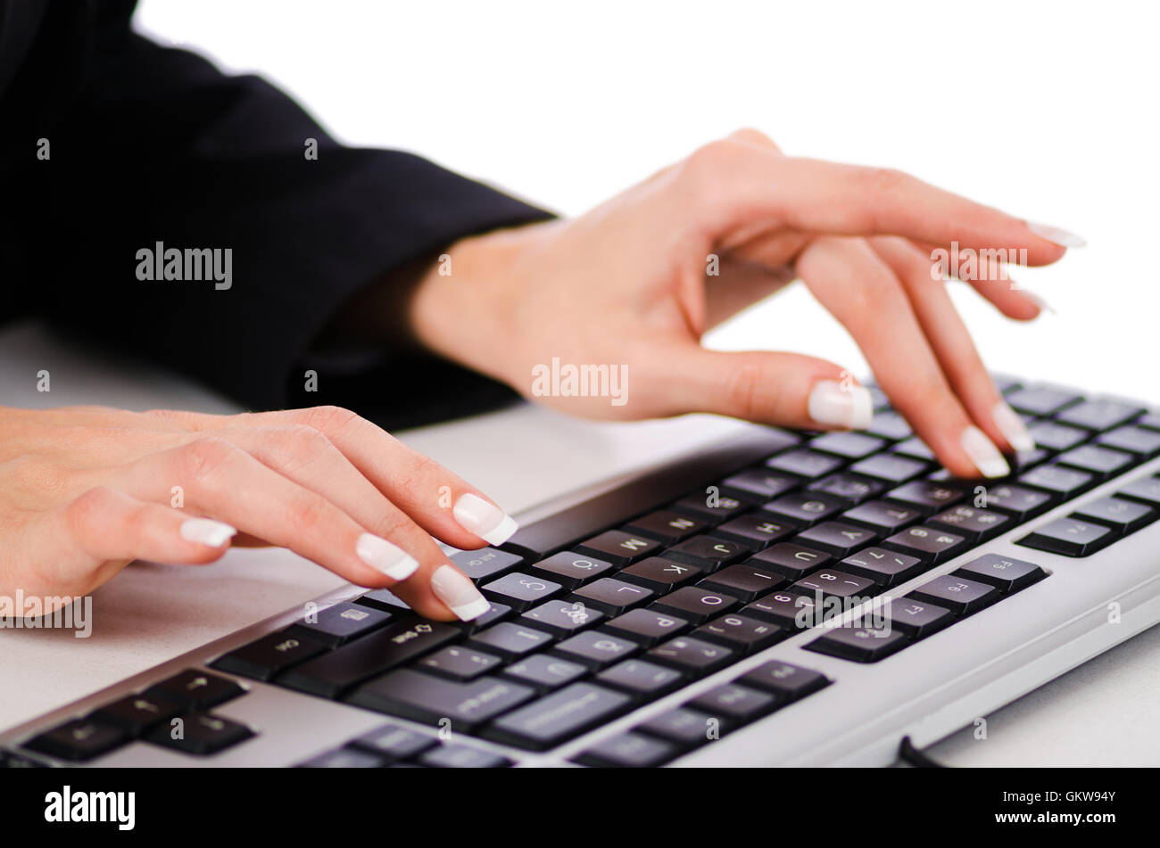Hands working on the keyboard Stock Photo - Alamy