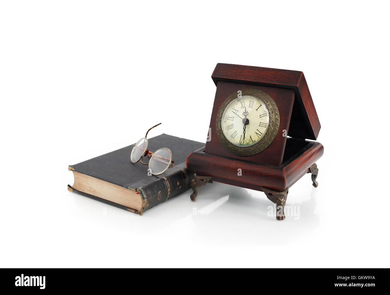 Old Clock And Book Stock Photo - Alamy
