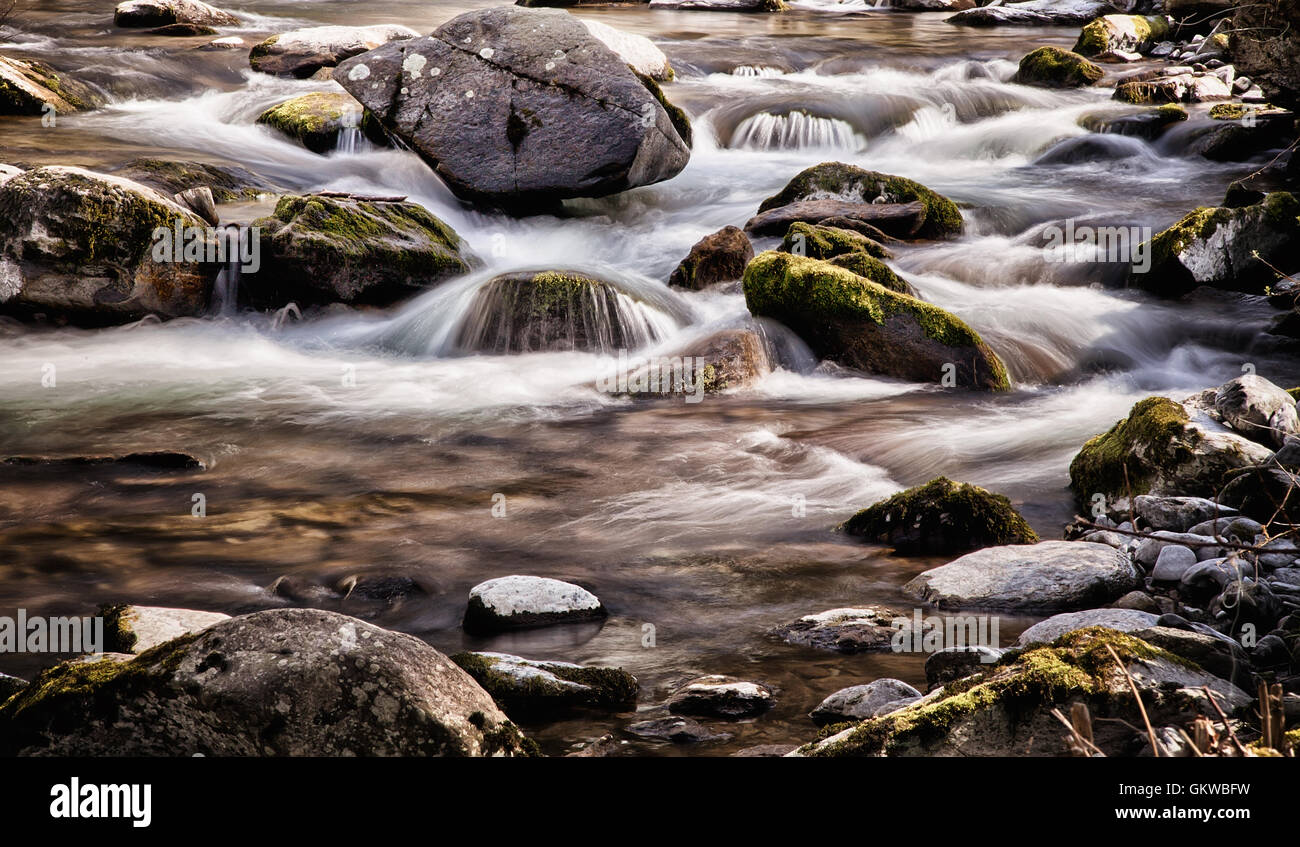River flowing over rocks Stock Photo - Alamy