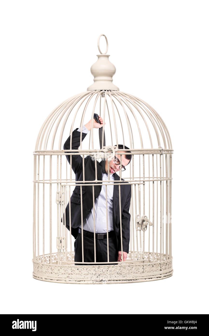 Man in a cage Cut Out Stock Images & Pictures - Alamy