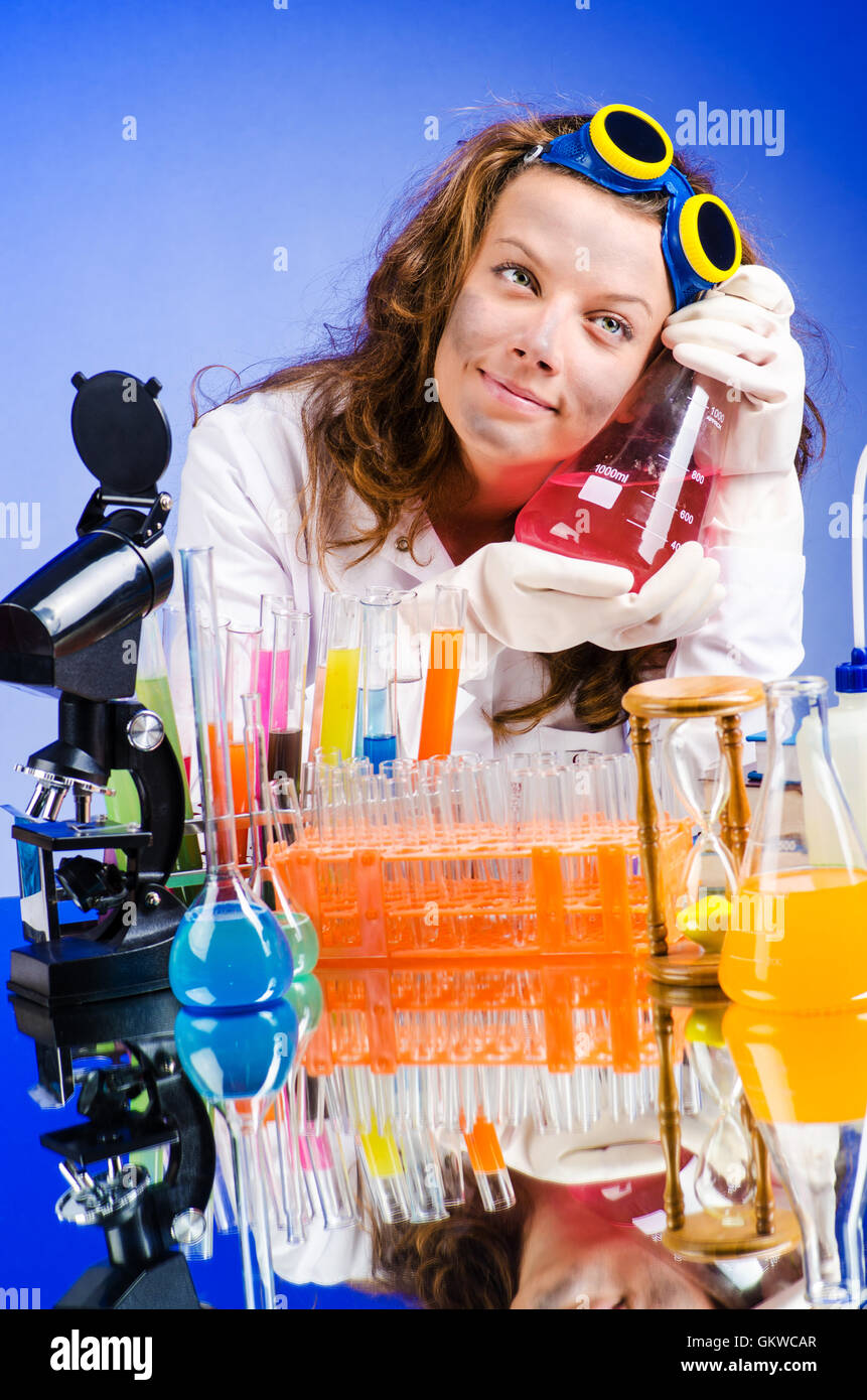 Funny female chemist in lab Stock Photo - Alamy