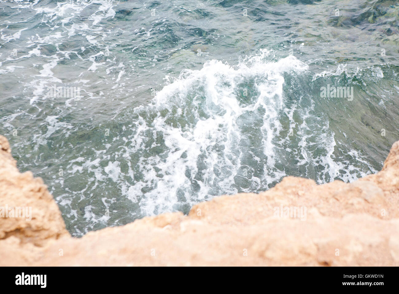 wave and stone Stock Photo - Alamy