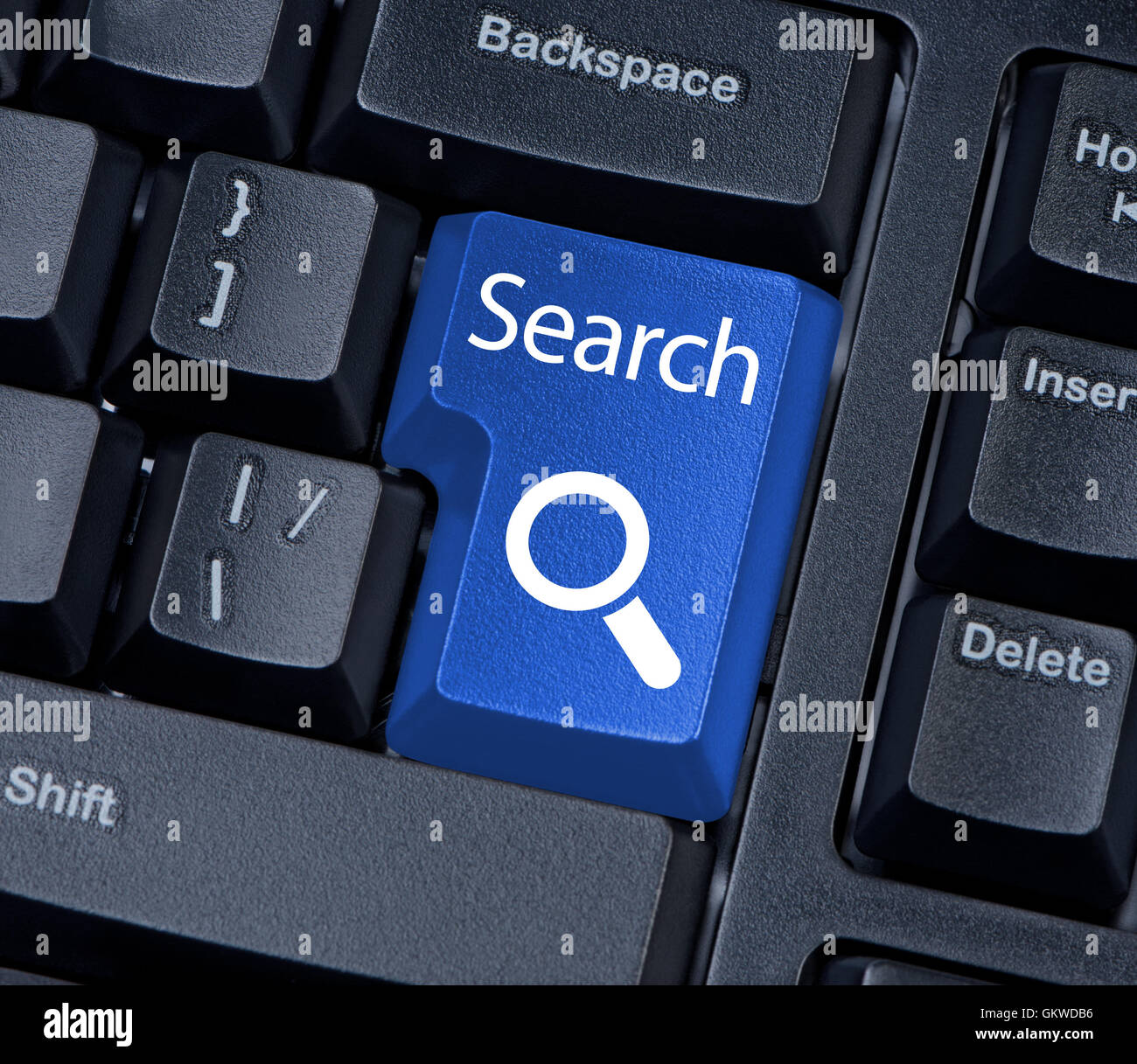 Search button computer keyboard with magnifying glass Stock Photo - Alamy