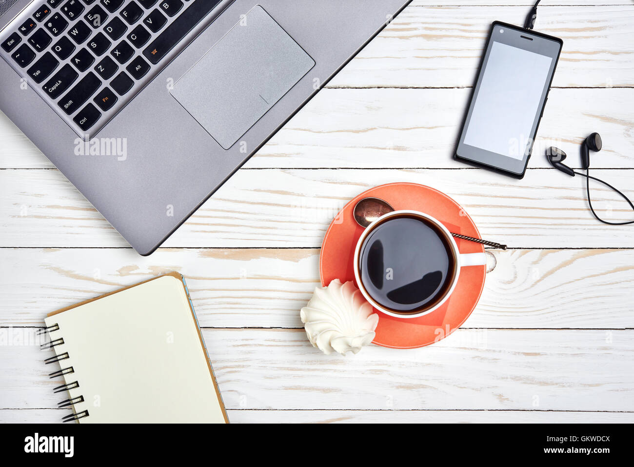 Office desk table with laptop, smartphone and coffee cup Stock Photo ...
