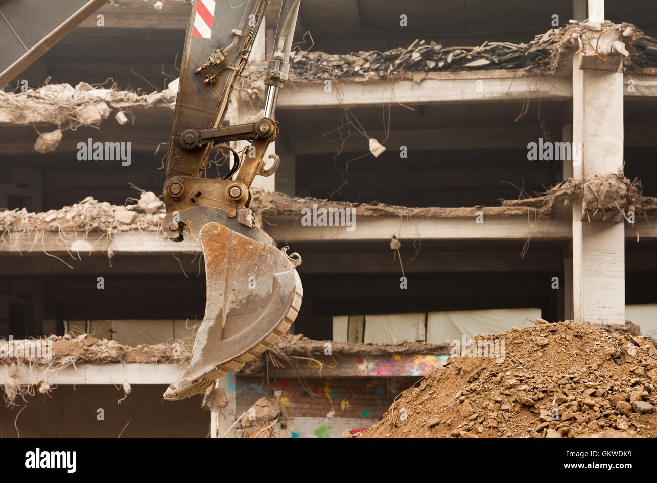 Destruction of concrete building with equipment Stock Photo - Alamy