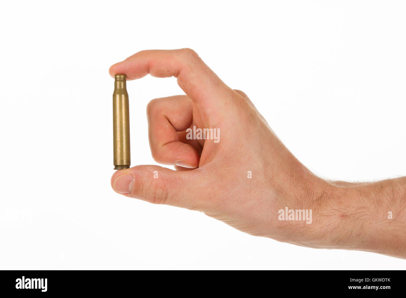 Hand holding an empty cartridge Stock Photo - Alamy
