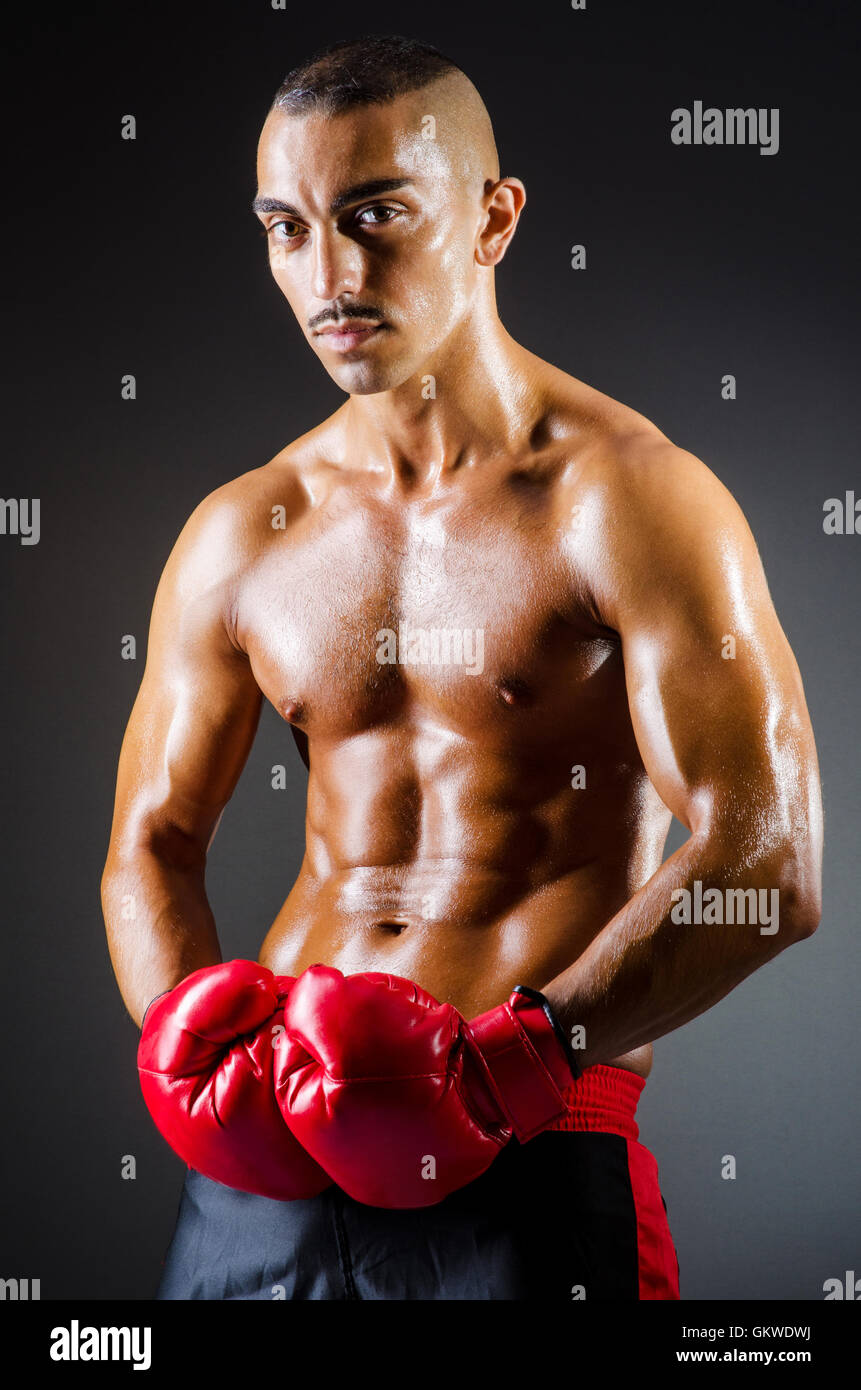 Muscular boxer in studio shooting Stock Photo - Alamy