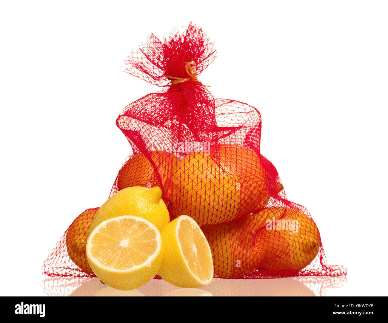 Lemons in net bag Stock Photo - Alamy