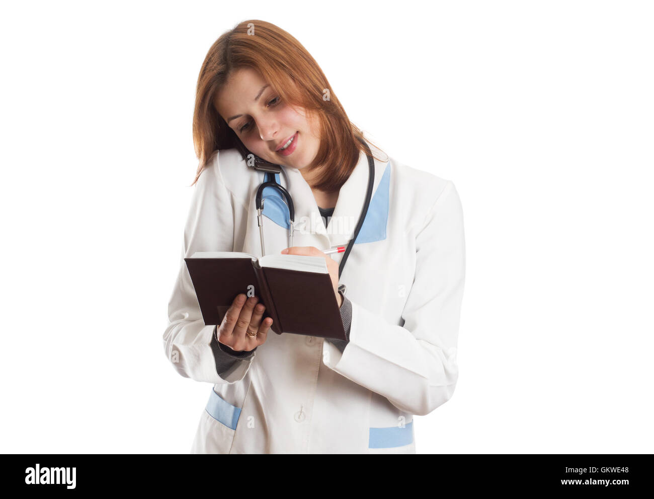 female doctor taking notes in a notebook Stock Photo - Alamy