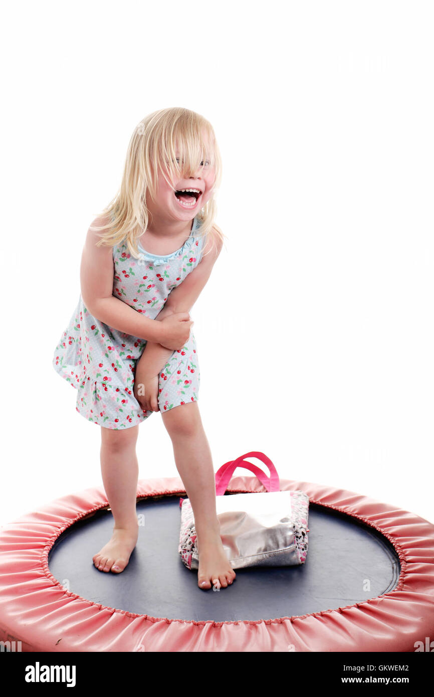 cute little girl on a trampoline Stock Photo - Alamy