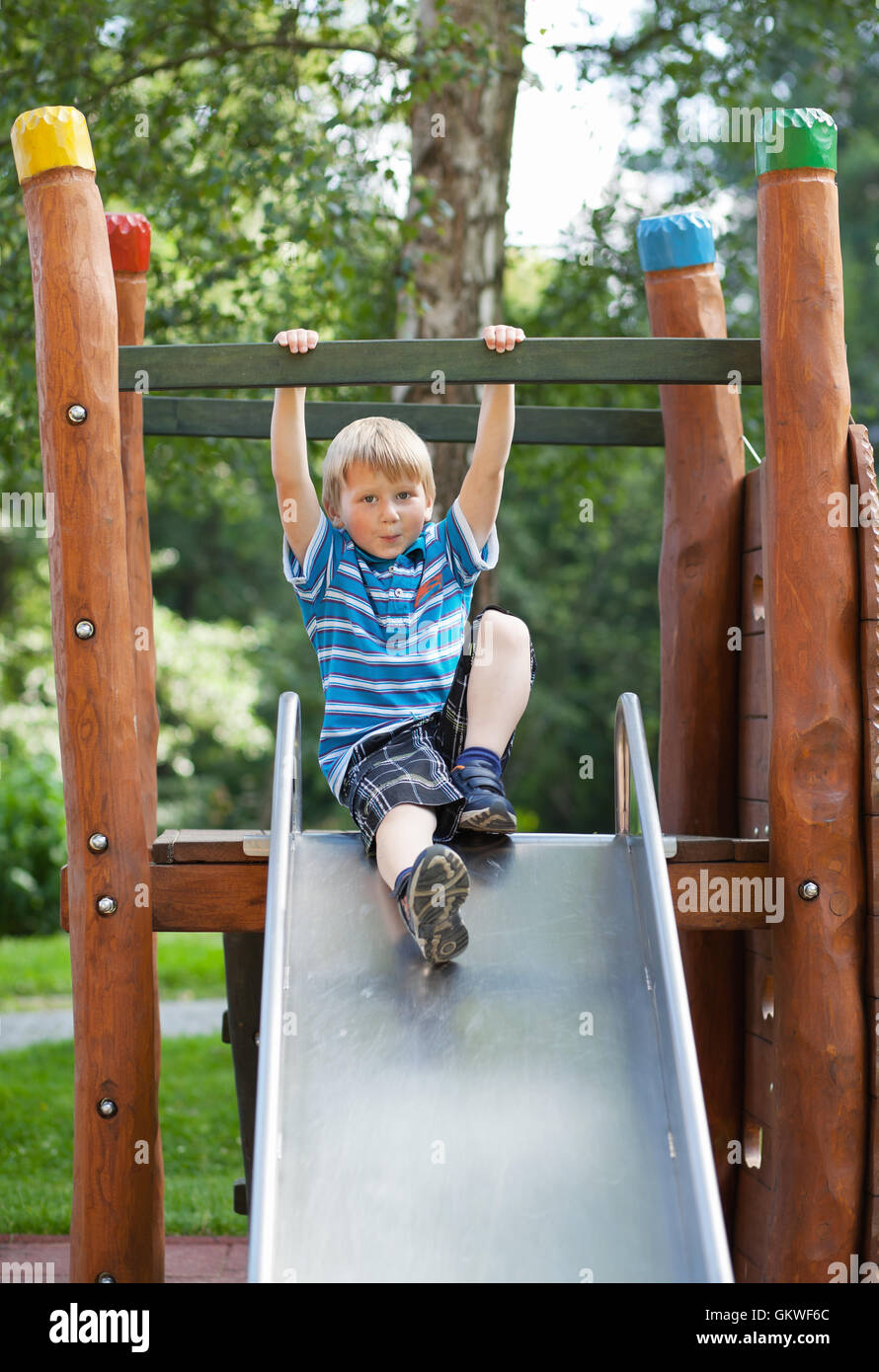 Boy at playground Stock Photo - Alamy