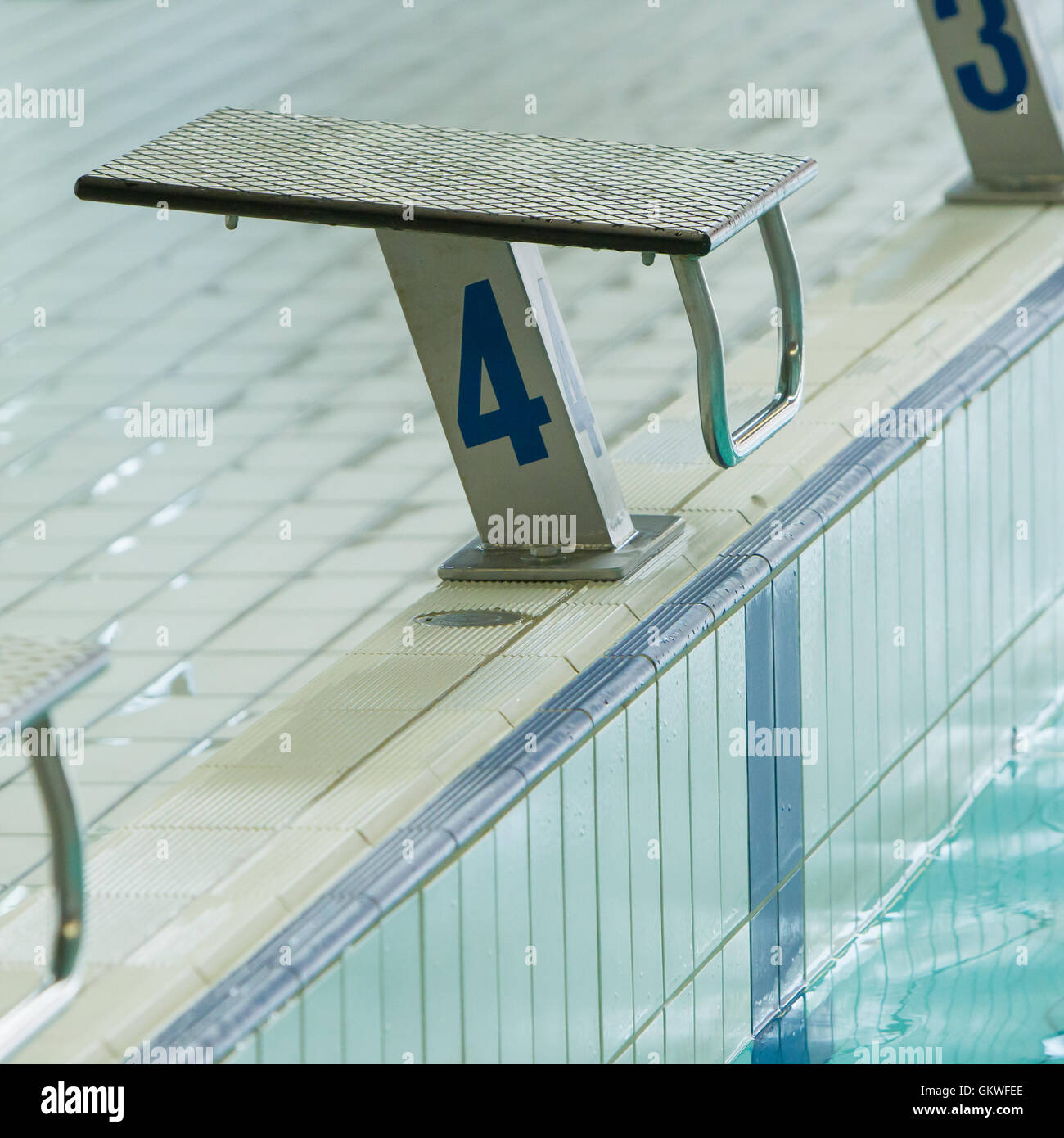 Swim race starting block Stock Photo - Alamy