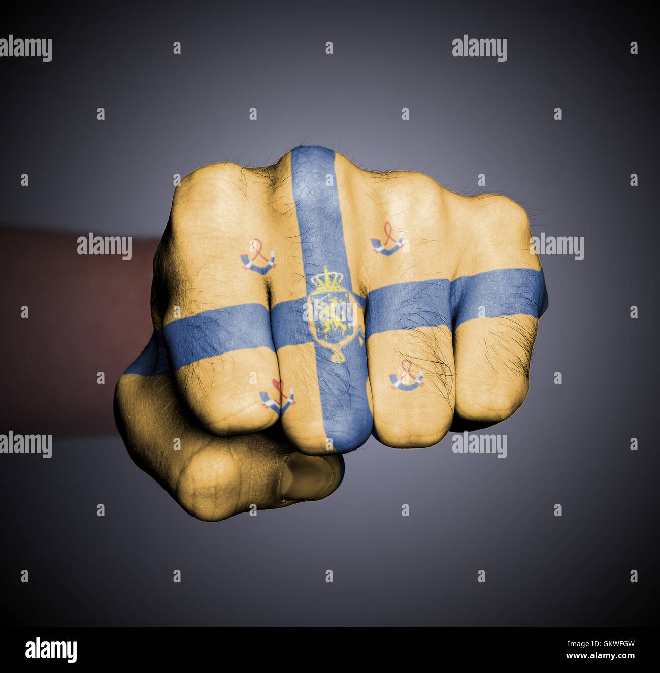 Front view of punching fist on gray background Stock Photo - Alamy