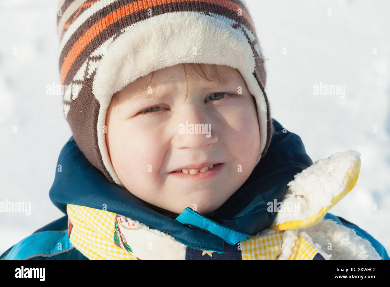 Portrait of boy in winter cloths outdoors Stock Photo - Alamy