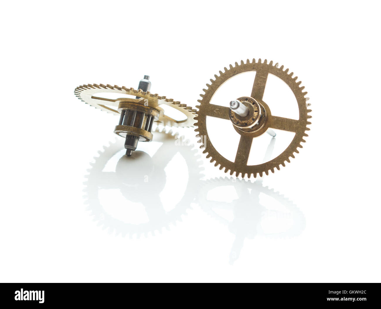gears from old clock isolated on white background Stock Photo - Alamy