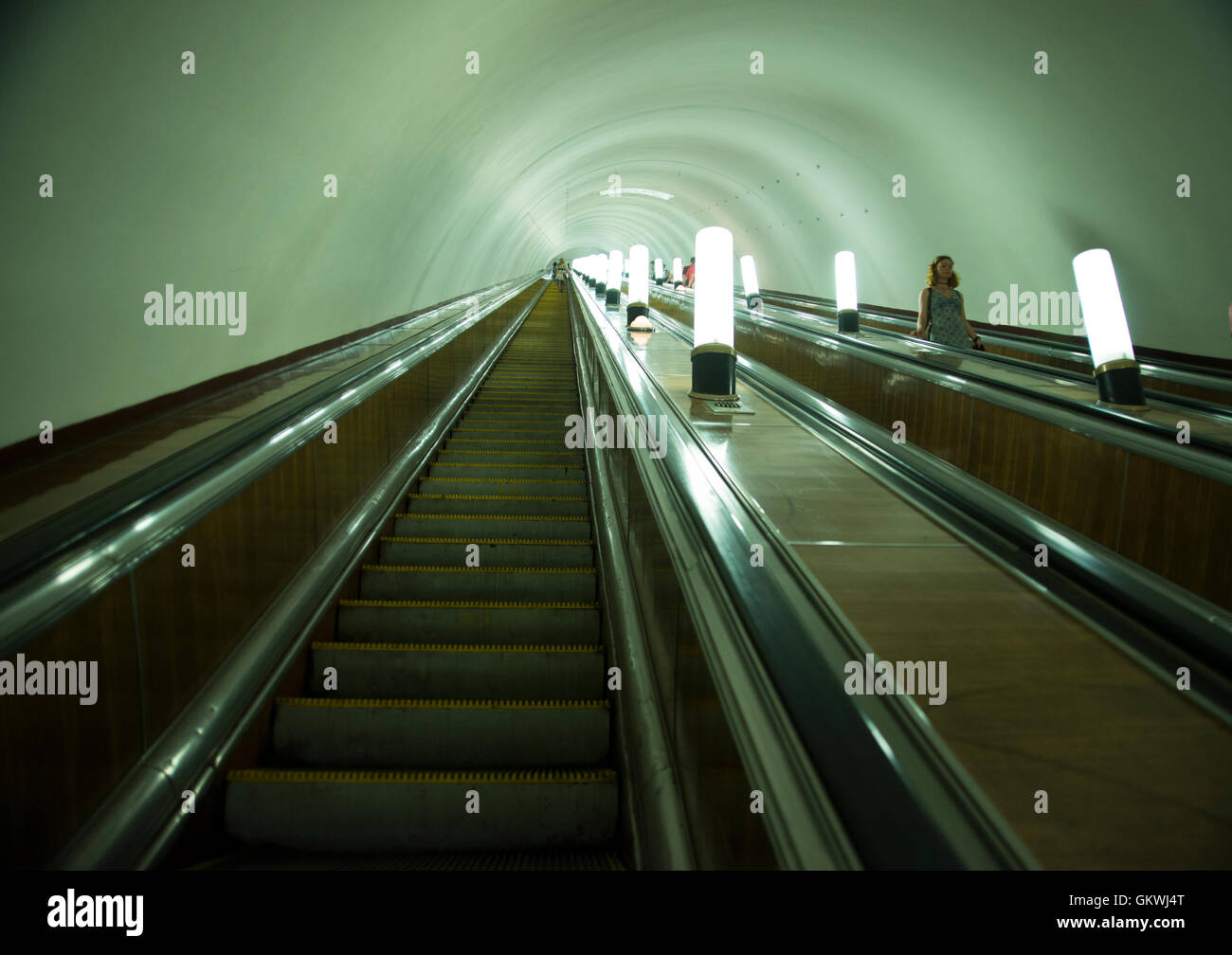 Escalator system at Metro in Moscow Stock Photo - Alamy