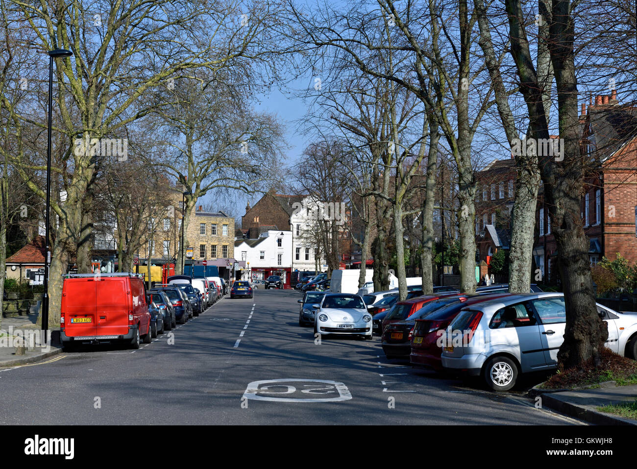 Echelon parking on one side of the road with parallel kerbside parking ...