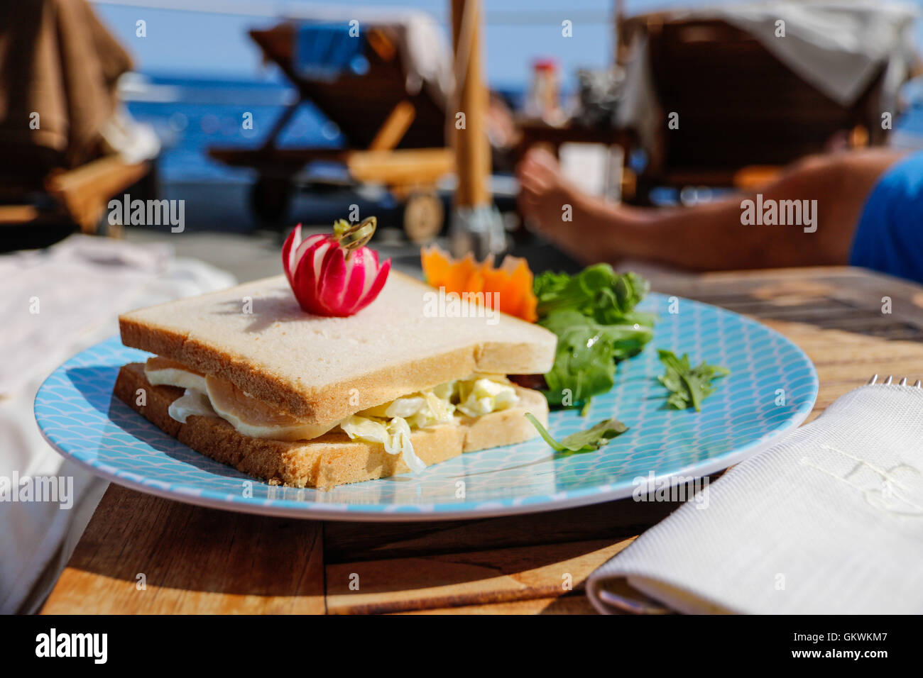 Chicken sandwich by the pool Stock Photo - Alamy