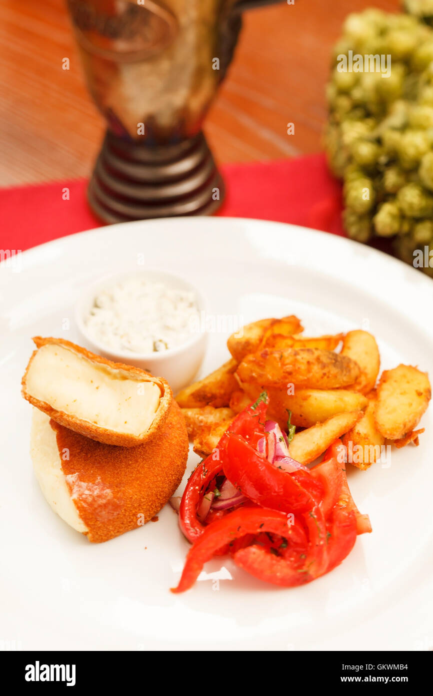 Deep fried breaded camembert hi-res stock photography and images - Alamy