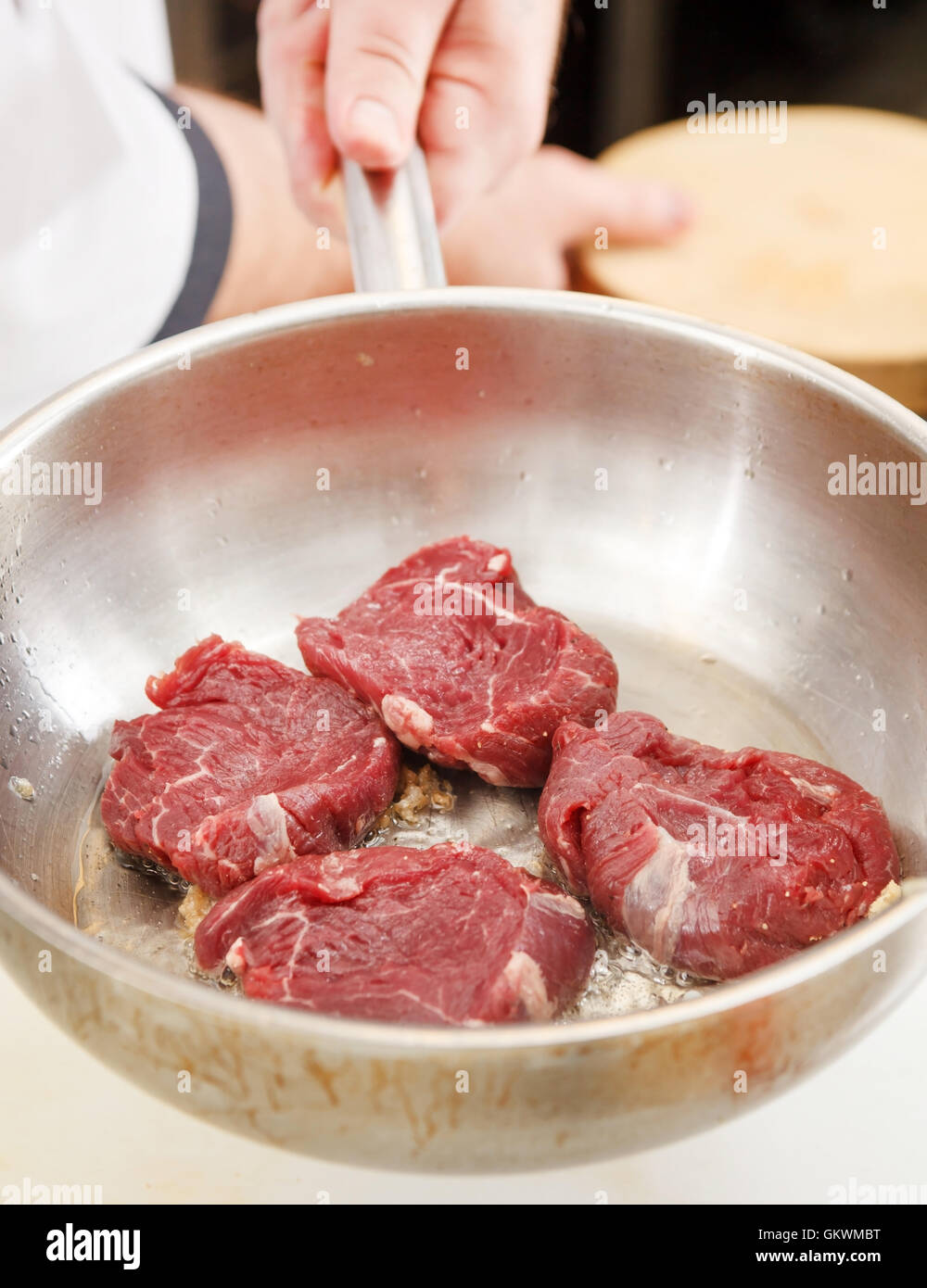 beef steak in a frying pan Stock Photo - Alamy