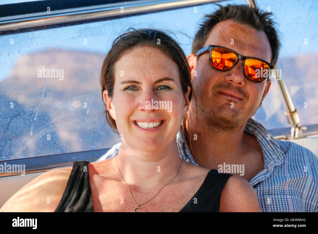 Young couple in love on a boat Stock Photo - Alamy