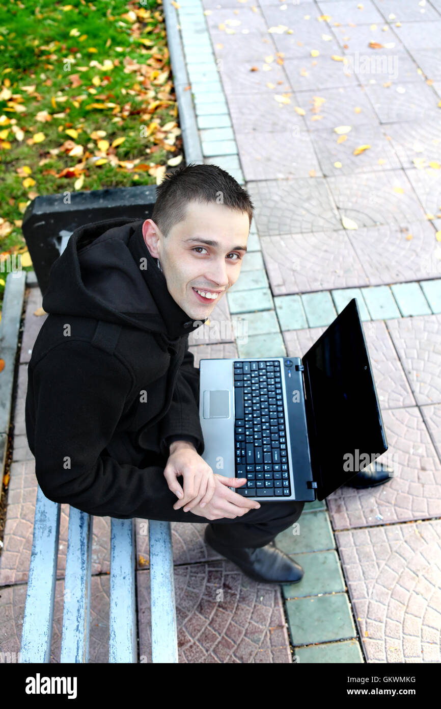 Man With Laptop Outdoor Stock Photo - Alamy