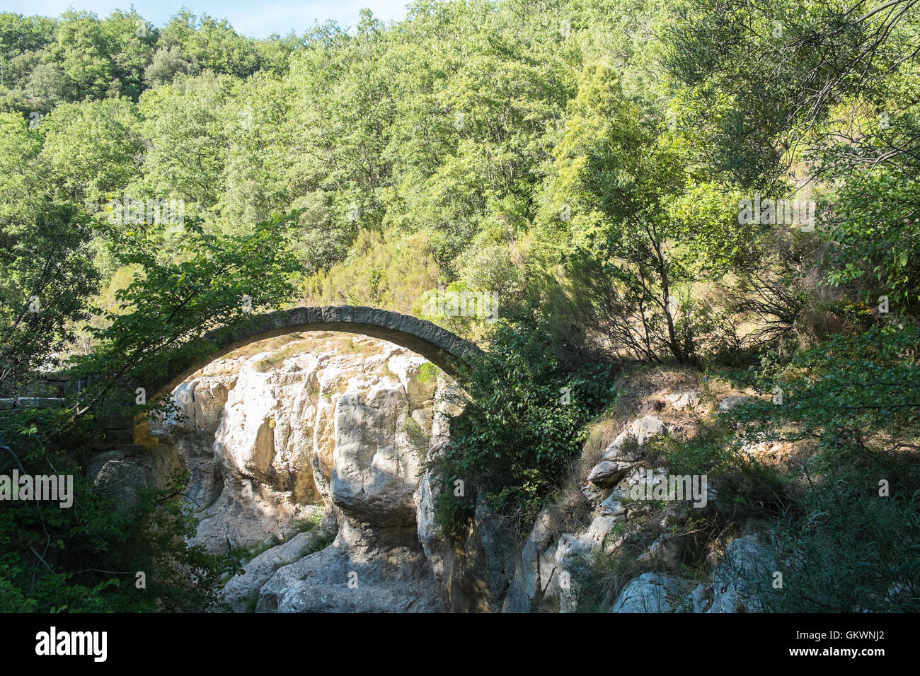 Arched roman bridge design shape in countryside near bugarach hi-res ...