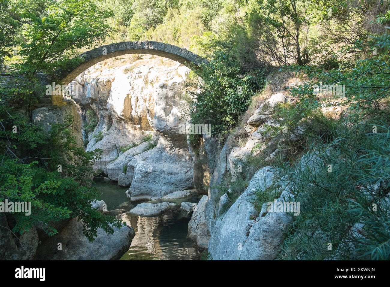 Arched Roman bridge design shape in countryside near Bugarach,Aude ...