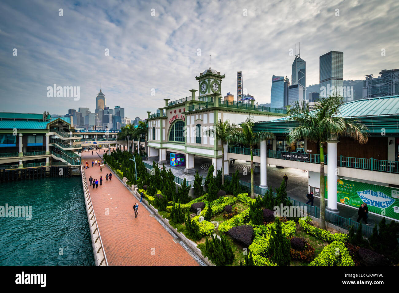 View of a waterfront promenade along the Victoria Harbour, in Hong Kong ...