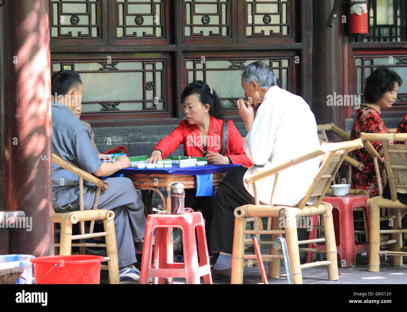 People play Mahjong (Chinese tile game)in People's park in Chengdu ...