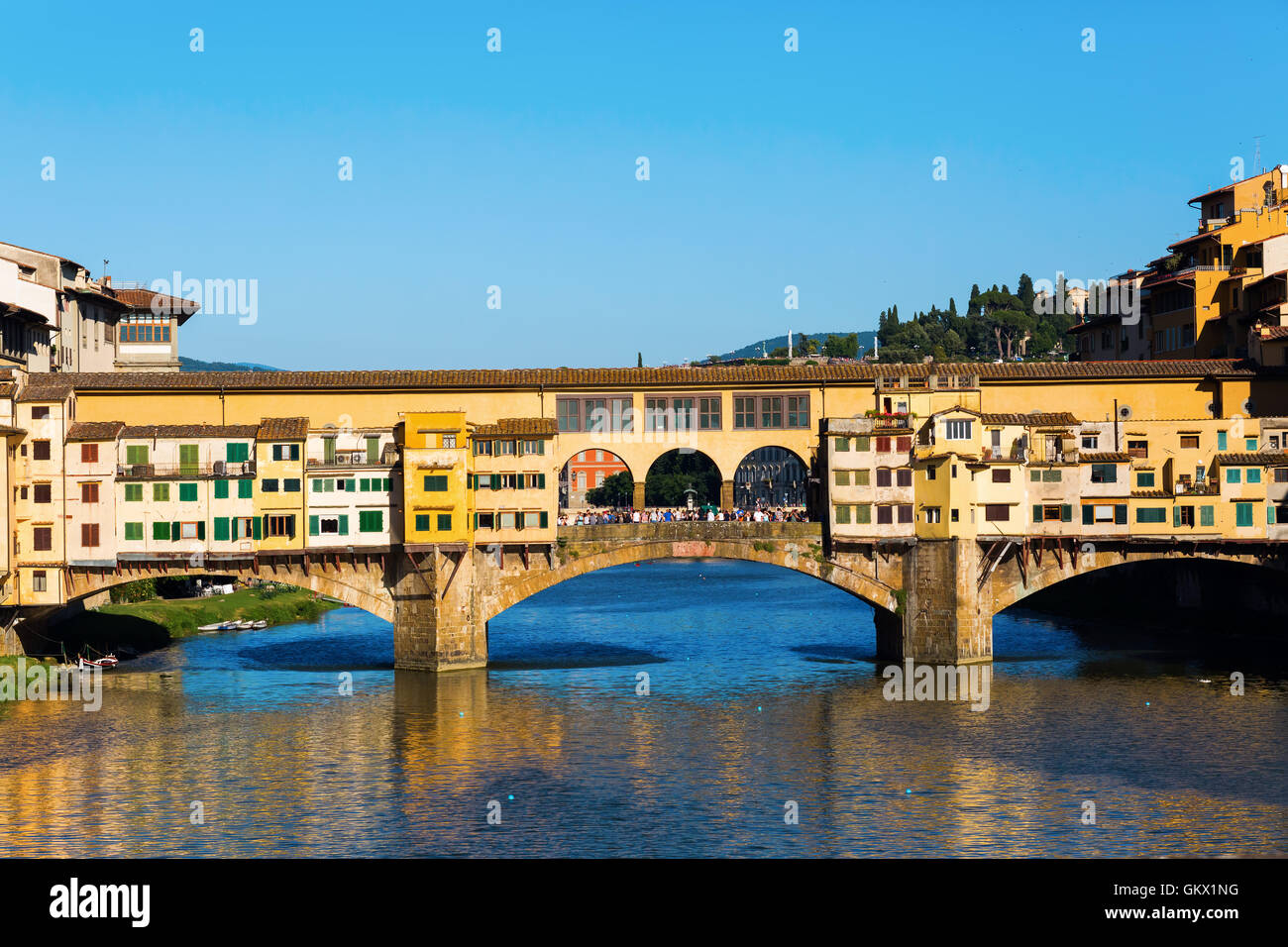 famous bridge over Ponte Vecchio over river Arno in Florence, Italy ...