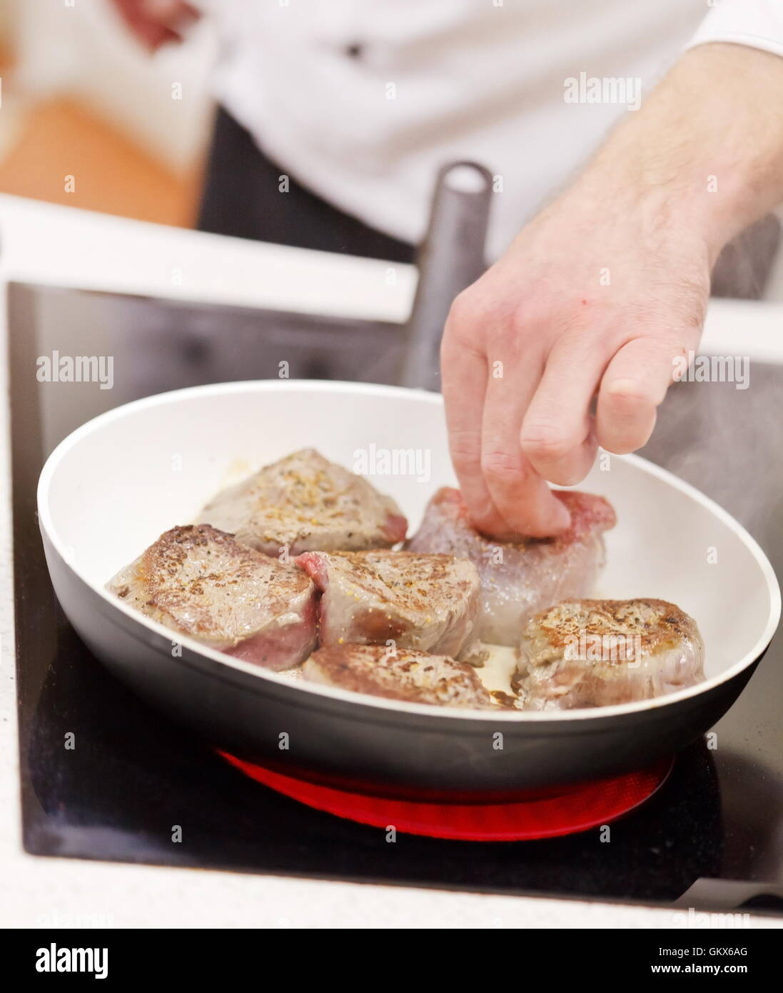 Meat frayed on fraying pan Stock Photo - Alamy