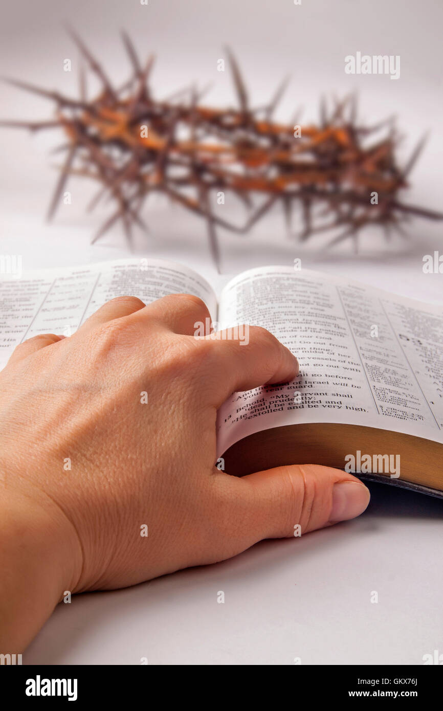 Human hand on bible Stock Photo - Alamy