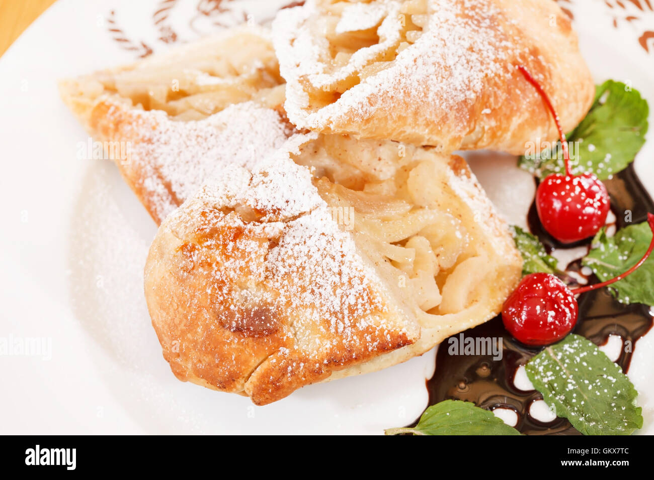 apple strudel with chocolate sauce Stock Photo - Alamy